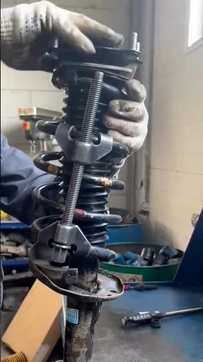 Shock Absorber Assembly, Remove / Install Coil Spring & Dust Cover #autoparts #automotive #mechanic