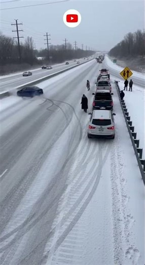 Frozen Highway Scare: Traffic Camera Captures Car Skidding on Ice