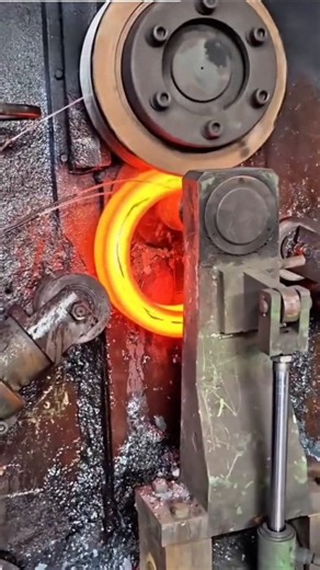 Brillianttechmech on Instagram: "Seamless Ring Rolling: Forging Strength with Heat & Pressure! 🔥⚙️ ​Witness the mesmerizing power of the Seamless Ring Rolling process! This is how a glowing, red-hot steel preform is forged into a high-strength circular component, widely used in critical machinery like wind turbines, jet engines, and heavy-duty bearings. ​The Art of Plastic Deformation ​Unlike machining which cuts material away, this process molds the metal to improve its properties: ​The Setup: