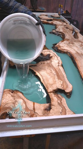 Jeremy Elkins on Instagram: "How rotten wood can sometimes be the best choice for a dining table, deep pour resin from @easypourepoxy ⚡🔥🌊 #UntreatedArt #interiordesign #resin #rivertable #epoxy"