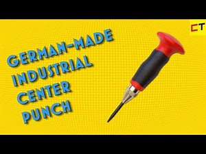 Spring-loaded self-striking center punch
