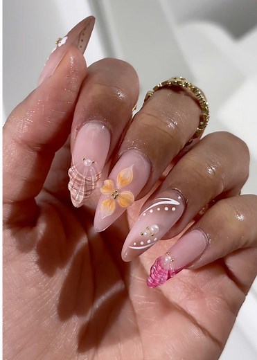 Tropical Nail Art for Summer: Flower and Shell Designs