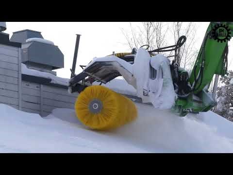 Roof Snow sweeping with a Merlo Roto Telehandler