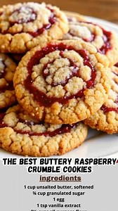 The Best Buttery Raspberry Crumble Cookies | Sweet, Jammy & Irresistibly Cozy 🍓🍪 These beauties are everything I love in a cookie — rich, buttery dough, a burst of tart raspberry jam, and a sweet crumble topping that bakes up golden and crisp. They look fancy, but they’re secretly so easy! Ingredients: For the cookie dough: 1 cup unsalted butter, softened ¾ cup granulated sugar 1 egg 1 tsp vanilla extract 2¼ cups all-purpose flour ½ tsp baking powder ¼ tsp salt For the filling topping: ½ cup r