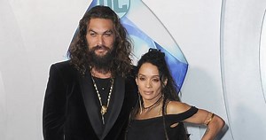 Aquaman — and Wife! Jason Momoa and Lisa Bonet Share a Kiss on the Red Carpet