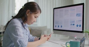 Adult female asia people happy smile sit easy relax work hybrid at home office enjoy WFH play typing chat look at mobile phone buy or paying SME retail loan, post read review social media app online.