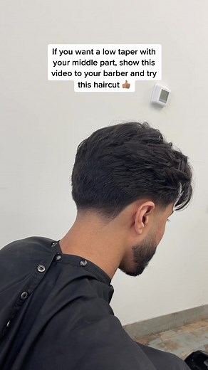 This classic middle part with a low taper is a LOOK. #middlepart #haircut #taper