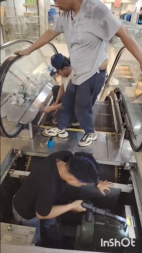 "The technician getting inside the machineroom of escalator?