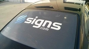 Installing a Perforated Car Window Decal | Signs.com