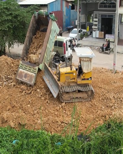 4.9K views · 107 reactions | New Project Launch: Using Mitsubishi BD2 G2 Bulldozer and Dump Trucks to Pour Soil | Dozer Tv | Facebook