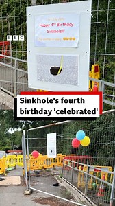 Happy Birthday to the Castle Cary sinkhole 🕳️ 🎂 It's become a "landmark" and "running joke" for locals. The local council says the issue is "complex". | BBC Somerset