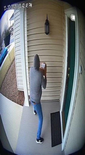 CCTV: Porch Pirate Gets Covered in Color Powder Explosion!