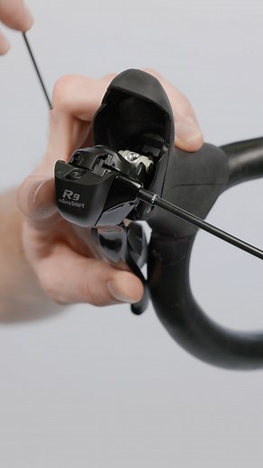 If you have Microshift drop bar shifters with external cable routing, how do you adjust the reach? We offer short reach shifter caps that can be installed in place of the stock one. They're easy to install and they can help you reach the brake levers more easily. | Microshift
