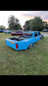 1995 Nissan Hardbody Dually Custom Crew Cab with a Nissan Frontier front end and tilt bed with a cantilever suspension setup at Last Resort Show • Owner: Jonathan Burgess #sickminitrucks #fblifestyle #lastresortshow | SICK Mini Trucks