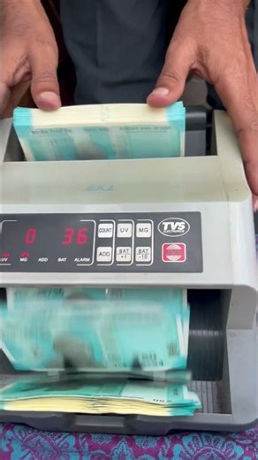 Counting 50-rupees cash 💵