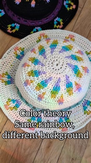 Lydia Viatoris on Instagram: "My newest pattern, the Sunburst Sunhat, is finally ready for testing! I had such a great time making these two twin rainbow hats, using the same exact palette for the rainbow elements, and simply altering the white and black backgrounds. It's wild how different the rainbows look against each color! #crochet #rainbow #sunhat #pridemonth"