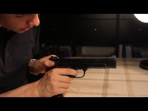 How to safely decock a rimfire pistol without damaging it through dry fire