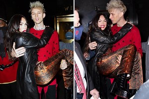 Machine Gun Kelly carries girlfriend Megan Fox through crowd ahead of SNL