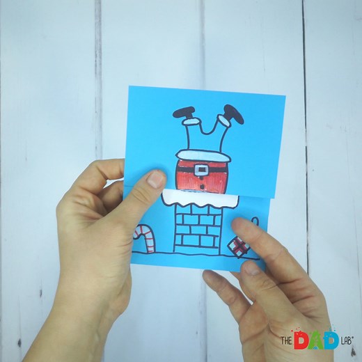 This Christmas, give your friends and family a card that will leave them giggling. Give them a Santa Stuck In Chimney Christmas Card to get them in the holiday spirit! #TheDadLab #christmascards #cardmaking | TheDadLab