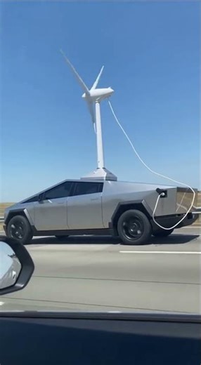 Tesla Cybertruck Charging on the Move ⚡💨 Wind-Powered Tech on the Open Road