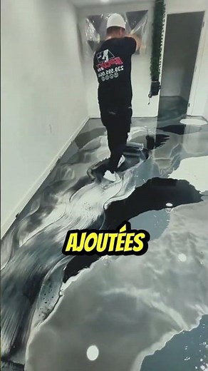 He transforms the floor into a work of art with epoxy resin!