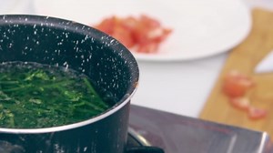 Premium stock video - Focus on a pot of edible fiddlehead ferns or diplazium esculentum blanching in boiling water to make pako salad, local filipino delicacy showing the authentic daily home life and heritage