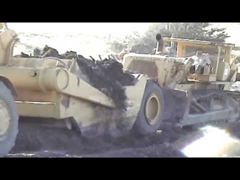 D9G Loading 630B Scraper