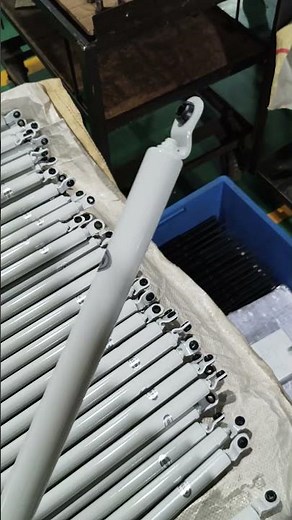 White compress gas spring with sheath