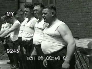 1930s Fat Men Use Mueller Exerciser Belt