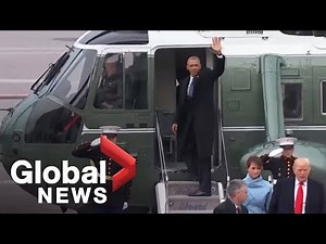Barack and Michelle Obama wave goodbye to Washington