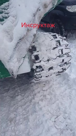 Close-Up View of Snow-Covered Green Tank