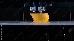 3d printer prints the model of the hand, the process of printing the hand prosthesis on the 3d printer. Accelerated video. 4k footage.