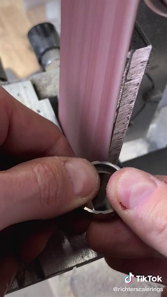 Making a distressed titanium and copper ring. #menswear #mensjewelry #wedding #weddingtiktok #weddingring