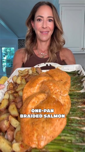 This One Pan Braided Salmon Tail is easier than it looks and tastes absolutely incredible! 🐟✨ The honey mustard glaze is sweet, tangy, and has just the right amount of kick from Calabrian chili. Everything roasts together on one sheet pan: crispy potatoes, tender asparagus, and perfectly flaky salmon braided for that wow factor. It's fancy enough for guests but simple enough for a weeknight dinner. Plus, minimal cleanup? Yes, please! Comment "RECIPE" for the printable version with nutritional v