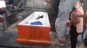 Woman rushed to hospital after 'banging on coffin' at her own funeral