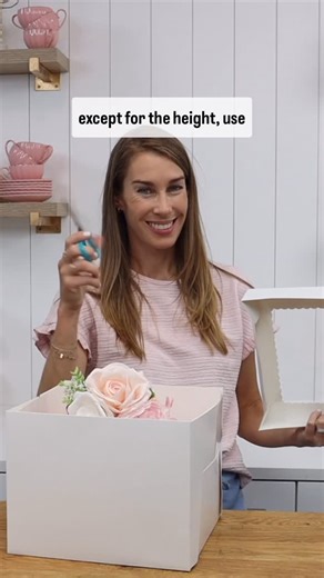 Emily | British Girl Bakes | Cake Decorating on Instagram: "Repurpose cake boxes for TALL or TIER cakes with this hack! Cut two diagonal slits into one of the side flaps of the box lid. The shorter the slits, the taller your box will become. Do the same on the opposite side flap. Now push the middle section (between the two slits) inside the cake boxes as you put the lid on, on both sides. The box lid will be raised up by the diagonal slits! Use this hack to turn regular cake boxes into tall box
