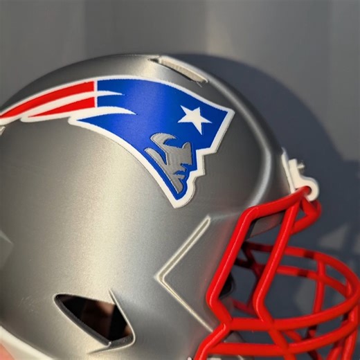Ryan on Instagram: "Layer by layer perfection! 🏈⚡ Watch this Patriots helmet come to life through the magic of 3D printing ✨ From digital design to physical reality - this is what precision engineering looks like! Perfect for any Patriots fan or 3D printing enthusiast. 🛒 Available now at the link in bio! 👉 https://www.initiativedesign.shop Drop a 🔥 if you want to see more NFL helmets printed! #3DPrinting #Patriots #PatriotsNation #NewEnglandPatriots #NFLHelmet #3DPrinted #FootballHelmet #Tim
