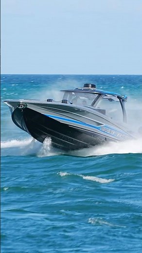 Gorgeous MTI power boat with all 5 engines at the Haulover Inlet