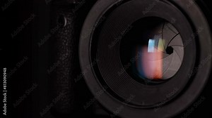 Close-up optical close-up black DSLR camera with closed iris diaphragm blades cine lens