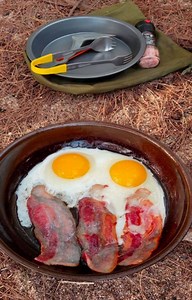 The only way to make bacon and eggs even better is to cook them over the wood flame of a Firebox Nano Camping Stove on a secluded beach in Oahu Hawaii's North Shore. | Firebox Stove