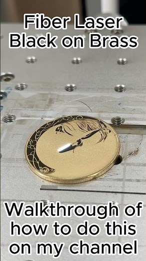 Black Fiber laser engraving on Brass coin