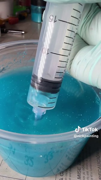 Making a vacuumed stress ball with ceramic balls and a mica powder, glitter and water stress ball #nickpainting #stressball #stress #fidget