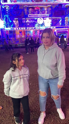 Capturing Joy at the Night Fair: Playful Moments