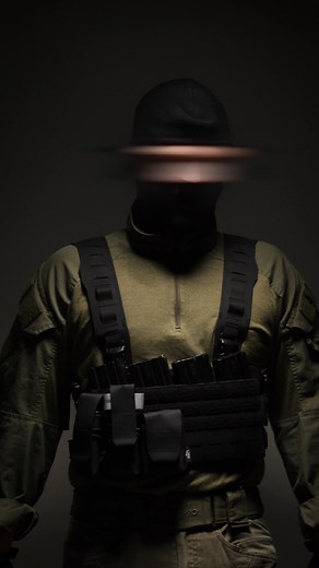 Black LP4 Chest Rig set up with two flashbang Pouches and a Handcuff Pouch. How does black gear fit into your setup? | Carcajou Tactical