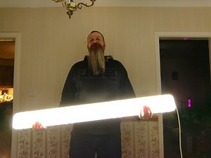 Salvaging and fixing a large faulty emergency light as a work light.