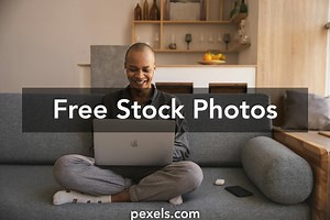 Free Smiling Guy On Computer Photos