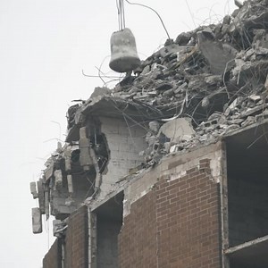 Not going down without a fight. #demolition #wreckingball #halifax #constructionlife #craneoperator #cranelife | Shaun Lowe Photographic