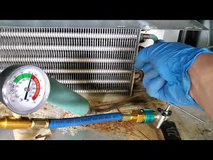 Adding freon gas on the soda pop vending machine