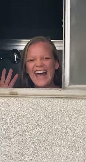 Girl gets stuck in window
