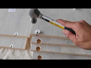 Placing Cam Locks on Fixed Shelves